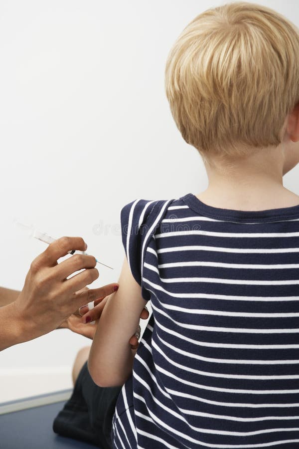 Boy Receiving Injection stock image. Image of patient - 29664025
