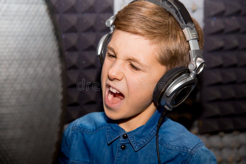 Boy in a recording studio stock photo. Image of concert - 109847576