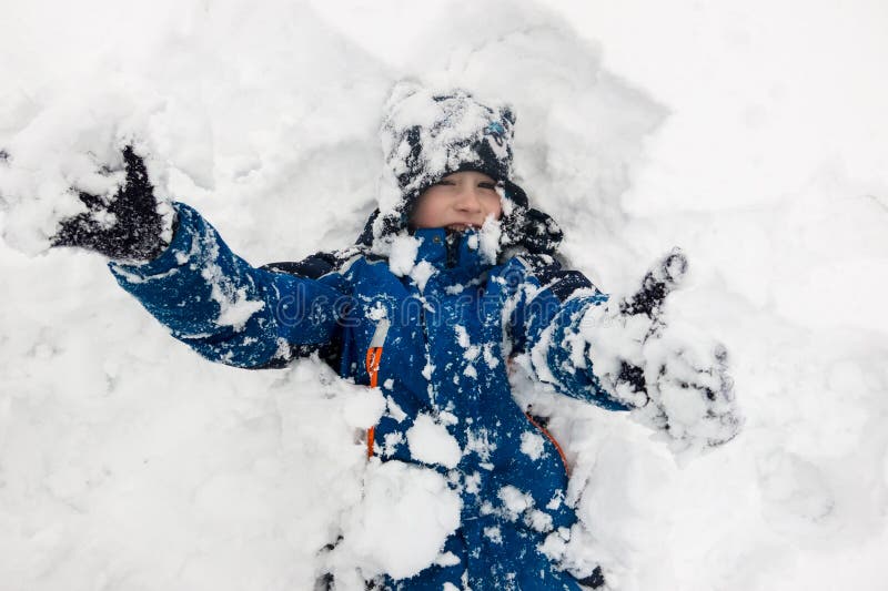 A boy in the snow stock photo. Image of happy, snow, game - 51899622