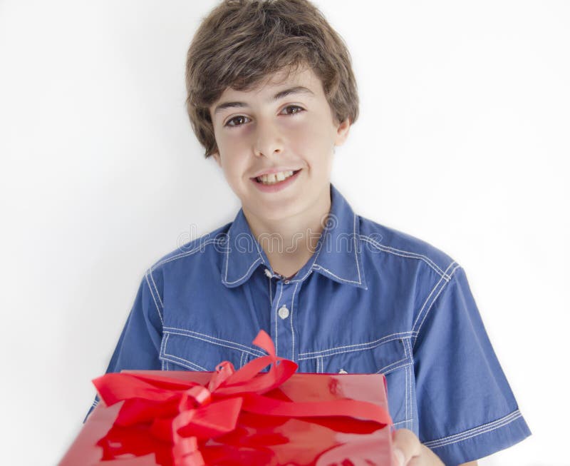 Boy with red gift stock image. Image of surprise, teen - 61309231