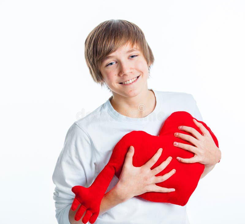 Boy with red heart stock image. Image of cheerful, hand - 23269393