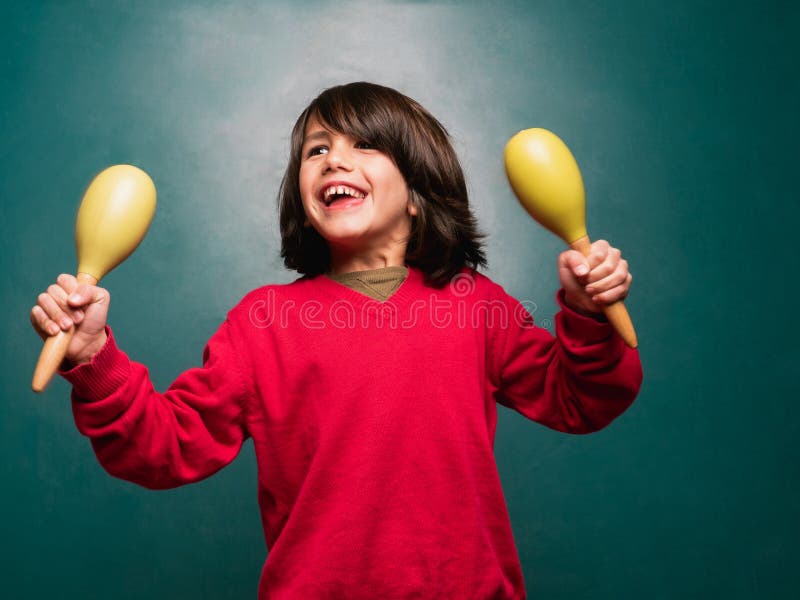 Boy Playing the Maracas in the School Stock Photo - Image of closeup ...