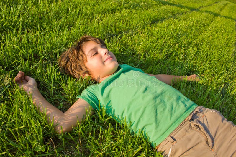 Boy relaxing in summer day stock image. Image of daydreaming - 21195803