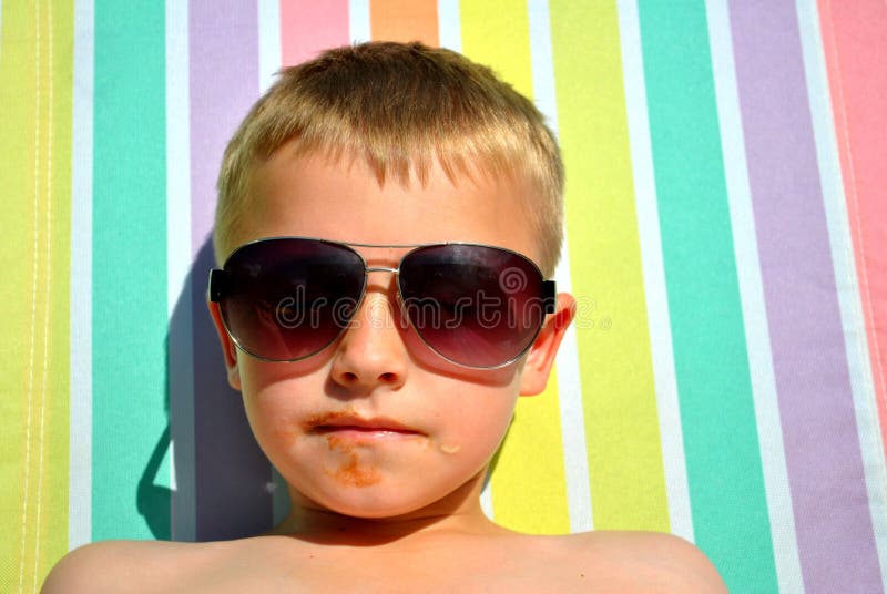 Boy Relaxing on the Sun Bed Stock Photo - Image of relax, rest: 43102320