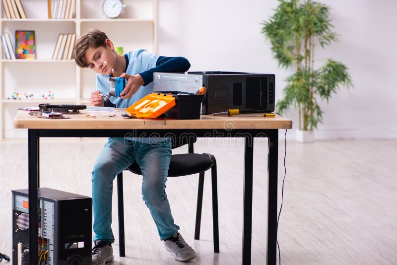 147 Teen Fixing Computer Stock Photos - Free & Royalty-Free Stock ...