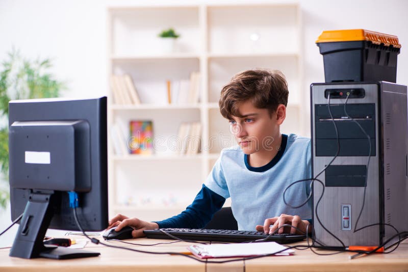Boy Reparing Computers at Workshop Stock Photo - Image of contractor ...