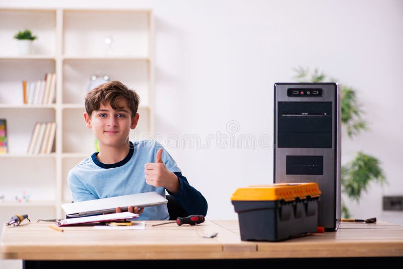 Boy Reparing Computers at Workshop Stock Photo - Image of repair ...