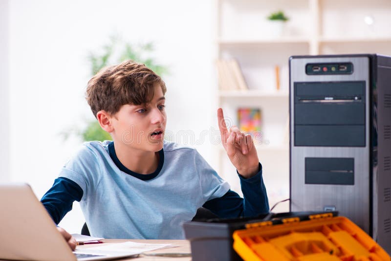 Boy Reparing Computers at Workshop Stock Photo - Image of upgrading ...