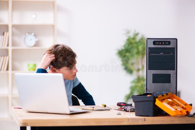 Boy Reparing Computers at Workshop Stock Photo - Image of hardware ...