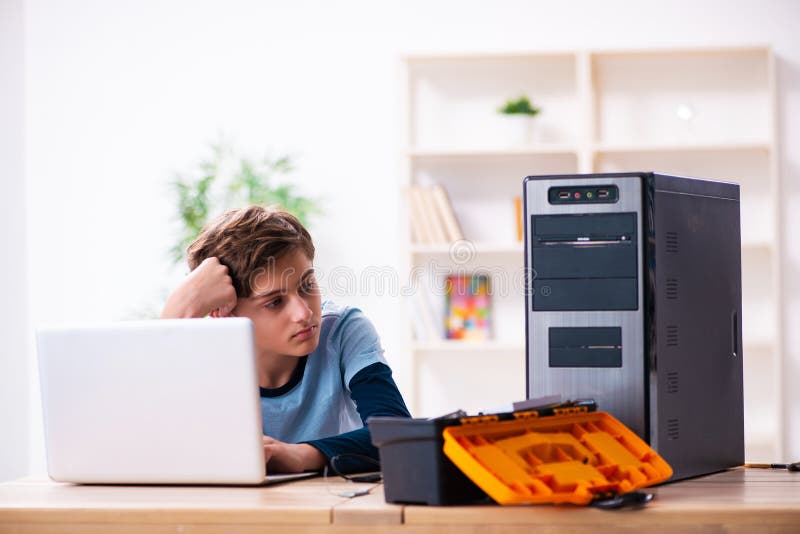 147 Teen Fixing Computer Stock Photos - Free & Royalty-Free Stock ...