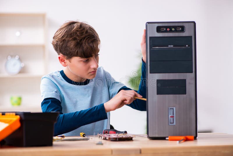 Boy Reparing Computers at Workshop Stock Image - Image of support ...