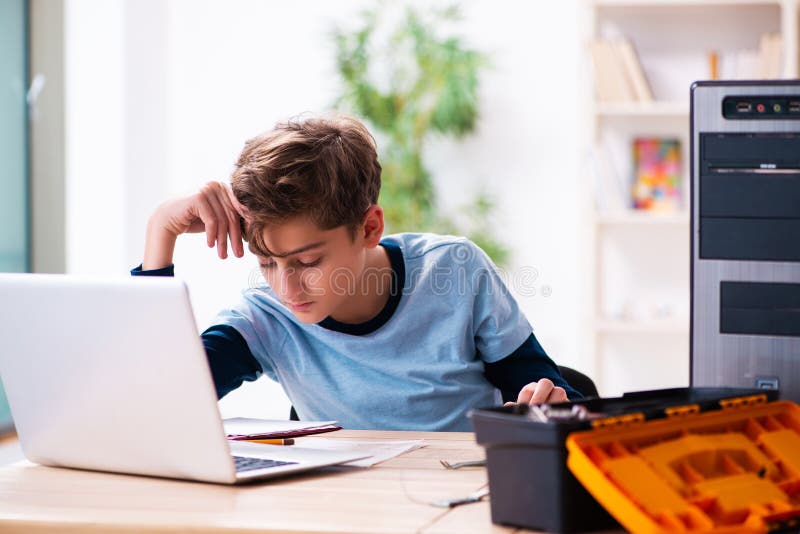 Boy Reparing Computers at Workshop Stock Image - Image of support ...