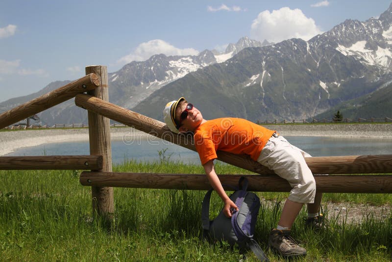 Boy rest in Alps stock photo. Image of grass, autumn - 30345968