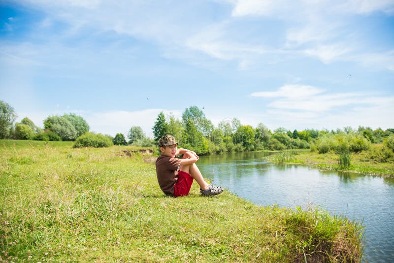 Boy Rest on the Banks of the River Stock Photo - Image of summer ...