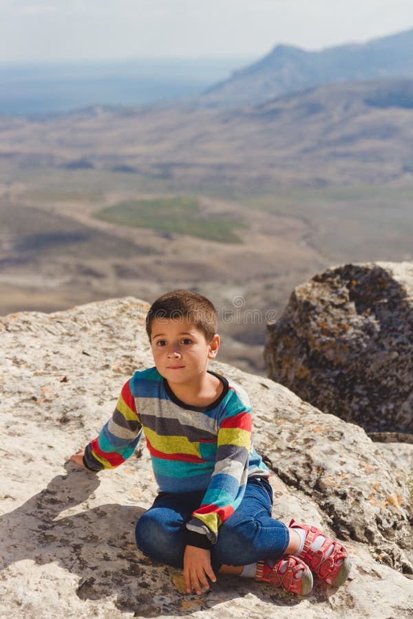 Boy Rest on the Rocks Over the Valley Stock Photo - Image of hiking ...