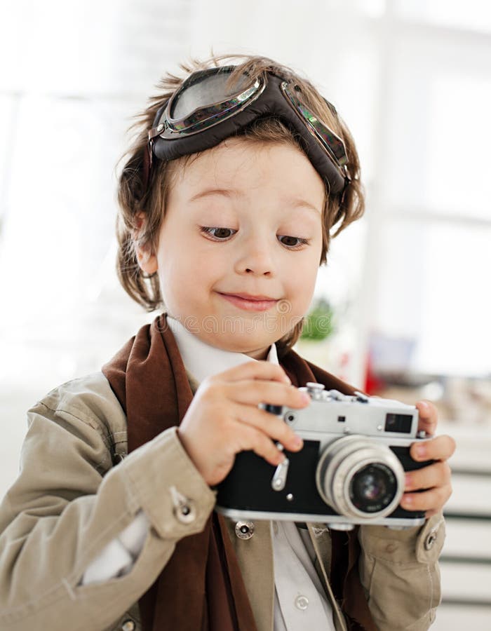 Boy with retro camera stock photo. Image of face, lens - 59499600
