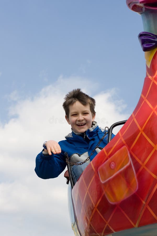 Boy on a ride stock image. Image of caucasian, ride, youngster - 2232735