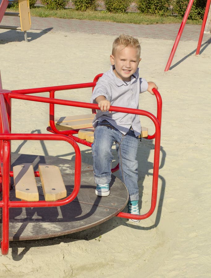 Boy ride on a swing stock photo. Image of smiling, excitement - 35967896