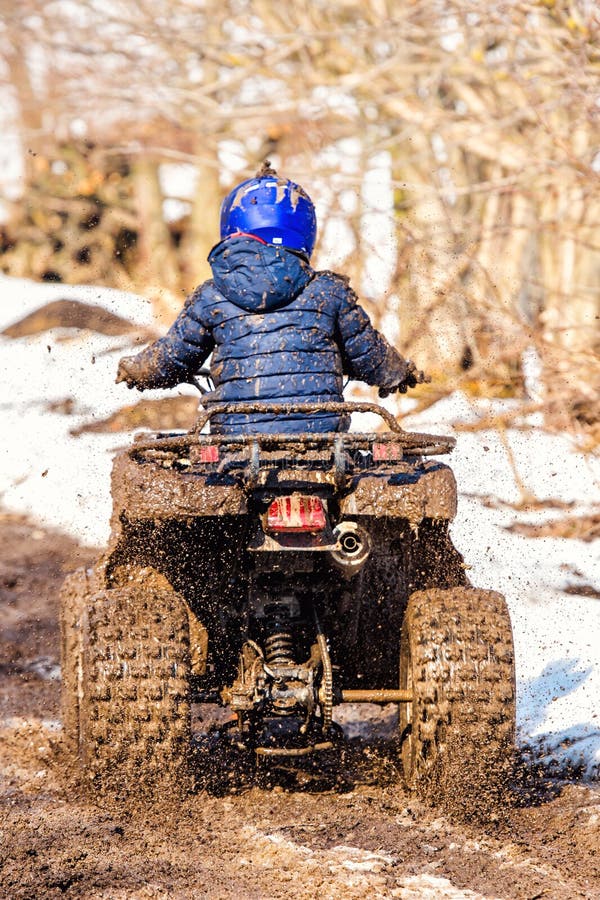 The Boy is Riding an ATV Off-road Stock Image - Image of quad ...