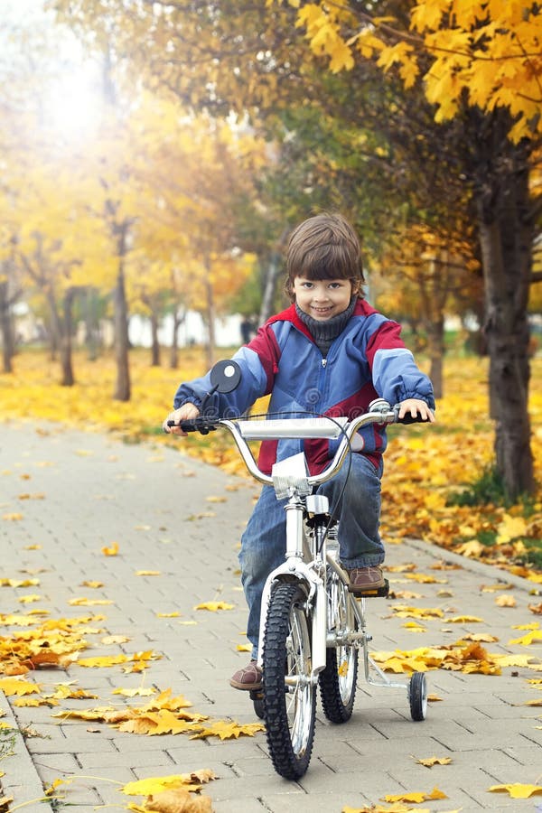 Boy riding a bicycle stock photo. Image of caucasian - 55721936