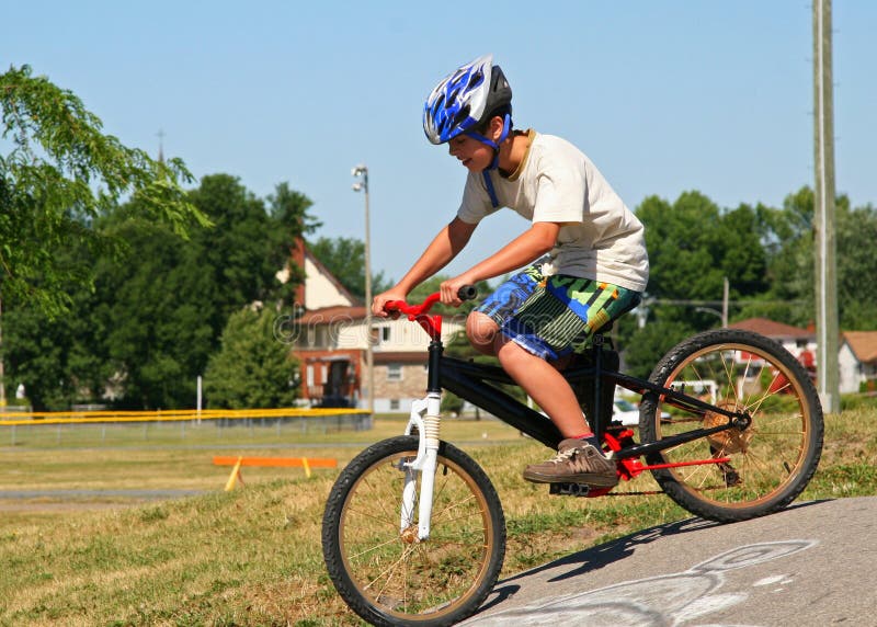 Boy Riding Bike on a Paved Driveway Stock Image - Image of fitness ...