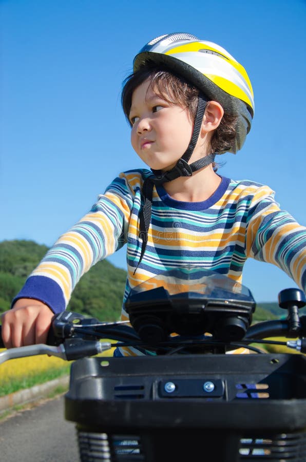 Boy riding a bike stock image. Image of active, october - 46609187
