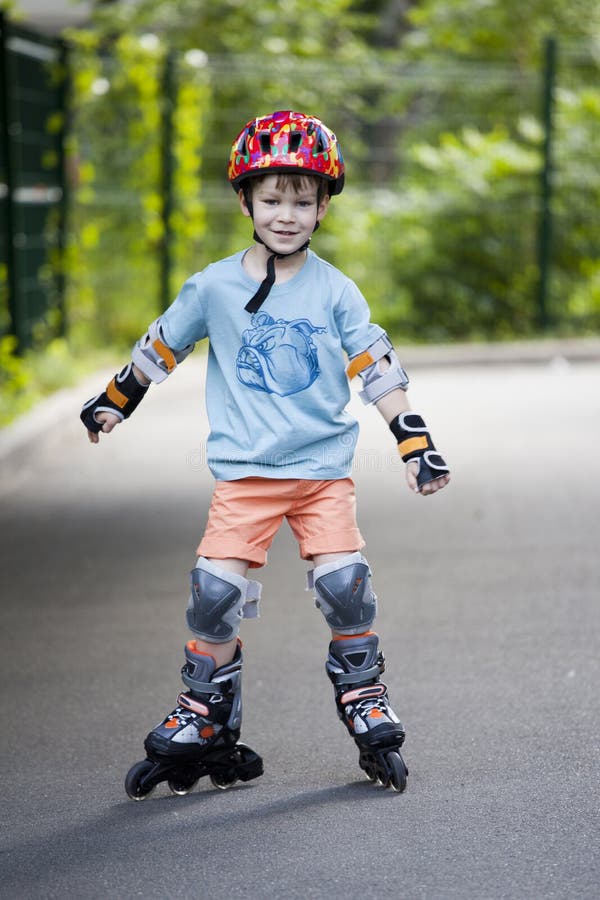 Boy Riding Rollers Park Alley Stock Photos - Free & Royalty-Free Stock ...