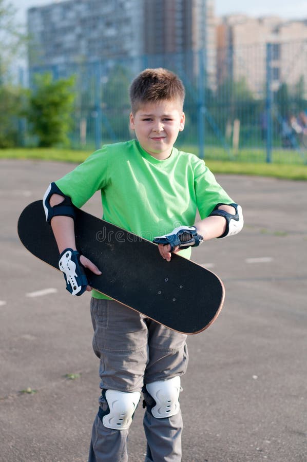 Boy riding a skateboard stock photo. Image of summer - 24846778