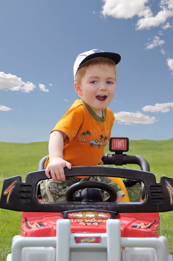 Boy riding toy jeep stock photo. Image of delightful, handsome - 5111780
