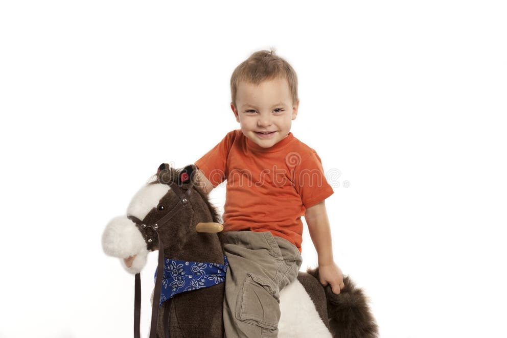 Boy and rocking horse stock photo. Image of fish, rocking - 22105354