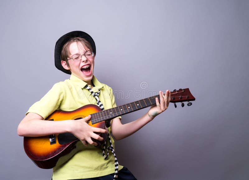 Boy scout guitar stock image. Image of scout, instrument - 11998183