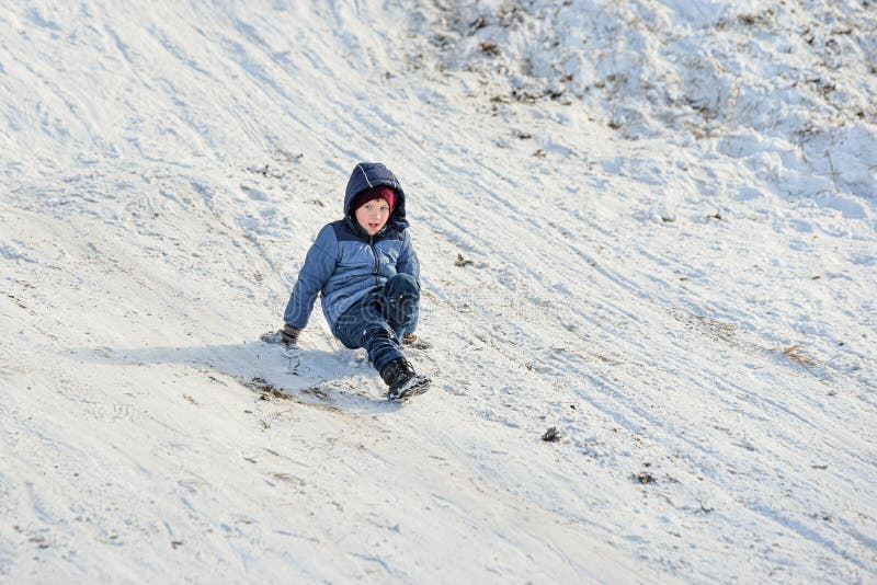 The Boy is Rolling in the Snow in Winter Stock Image - Image of love ...