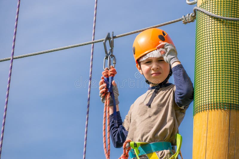 Boy in the rope park stock photo. Image of brave, entertainment - 148298472