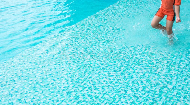 Boy run in swim pool stock photo. Image of laughing, swim - 42607756