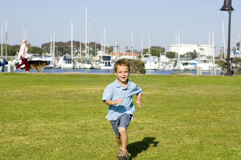 Boy running stock image. Image of blue, laugh, happy - 10232563