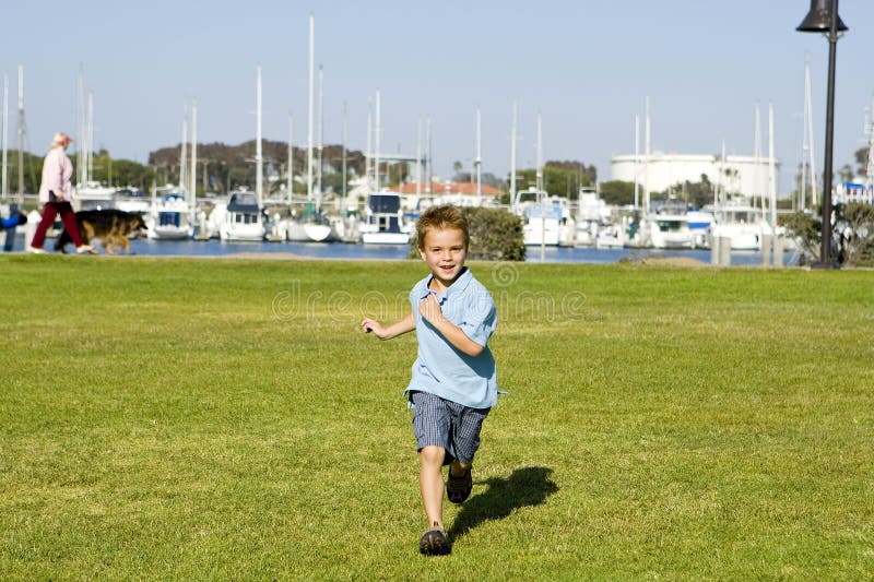 Boy running stock image. Image of blue, laugh, happy - 10232563