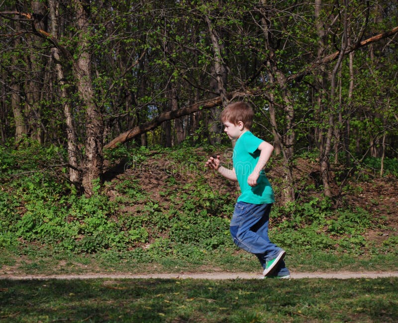 Boy Running Along the Forest Path Stock Photo - Image of play, nature ...
