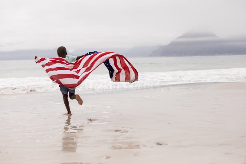 Boy Running with American Flag on the Beach Stock Image - Image of ...