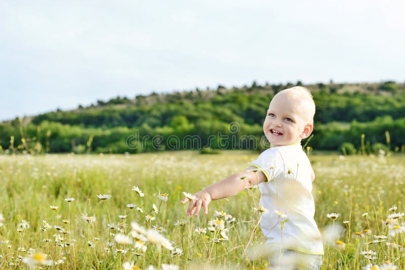 Boy running in field stock image. Image of portrait, beautiful - 34019013