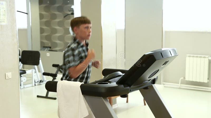 Boy Running on the Treadmill Stock Video - Video of health, equipment ...