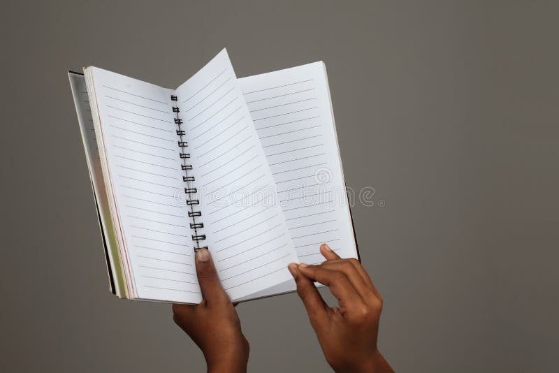 A Boy`s Hand Flips the Pages of a Book Stock Photo - Image of school ...