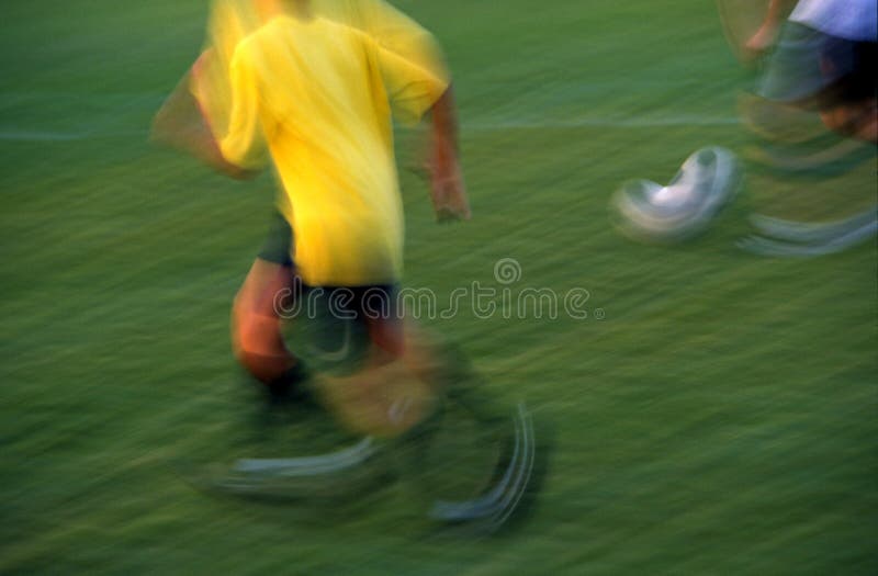 Boy s Soccer in Motion stock photo. Image of kicking - 11772372