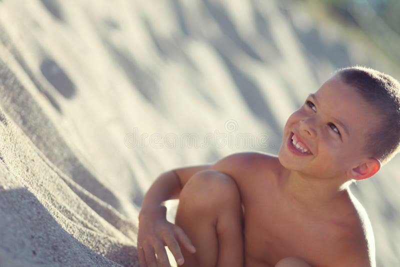 Boy in Sand on Beach with Smile Stock Image - Image of happy, happiness ...