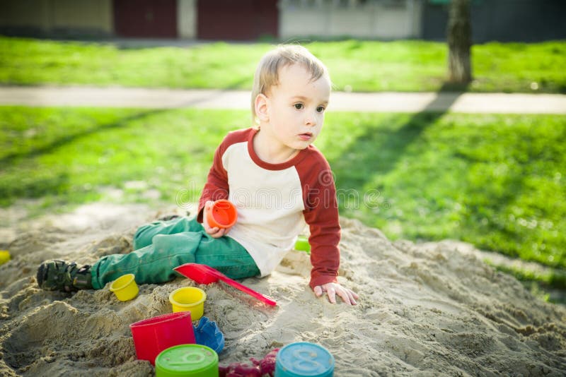Boy and sand stock photo. Image of color, kids, autumn - 91559702