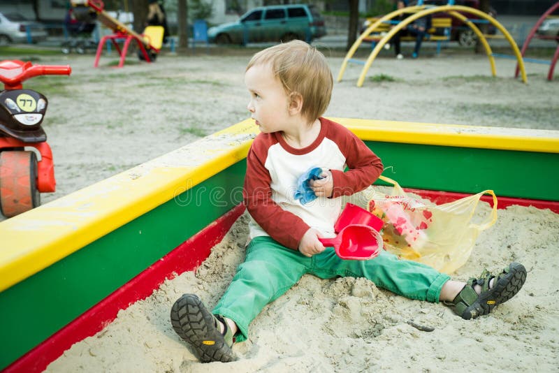 Boy and sand stock image. Image of sunny, color, holiday - 91559757