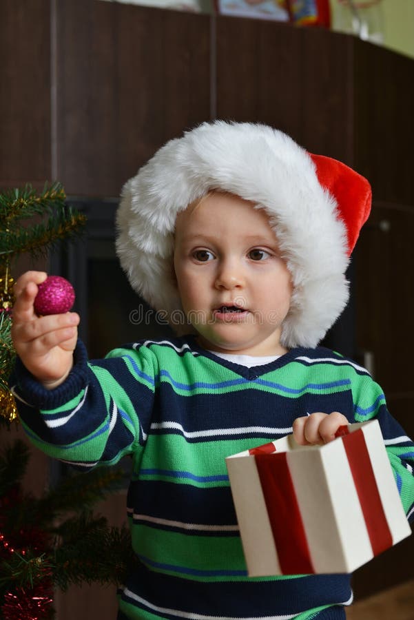Boy in santa cap stock image. Image of winter, portrait - 27771875