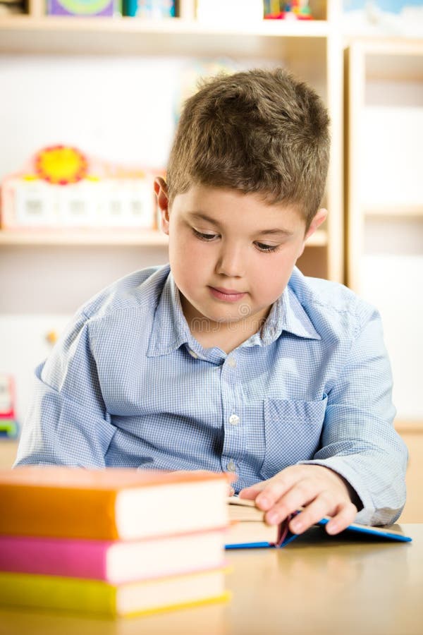 Boy at school stock photo. Image of pencil, elementary - 50935710