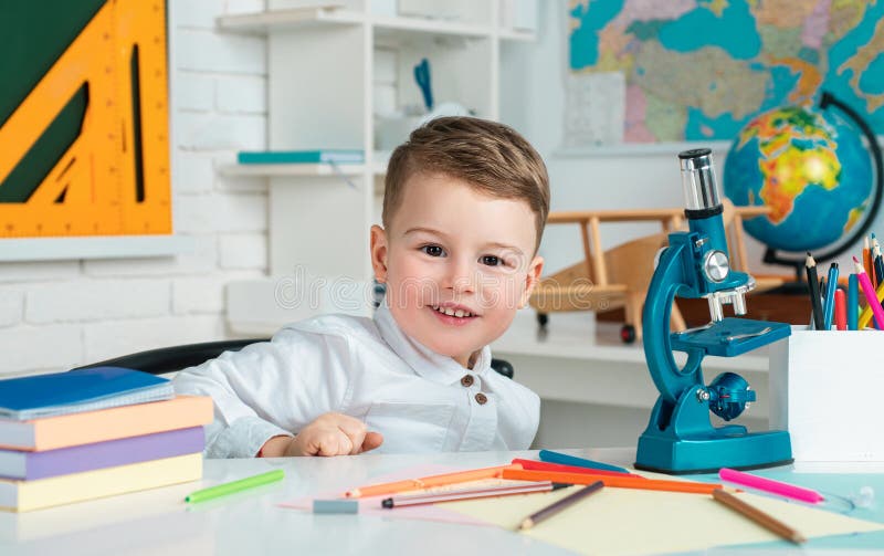 Boy at School Lunch Table Smiling To Camera. Stock Image - Image of ...
