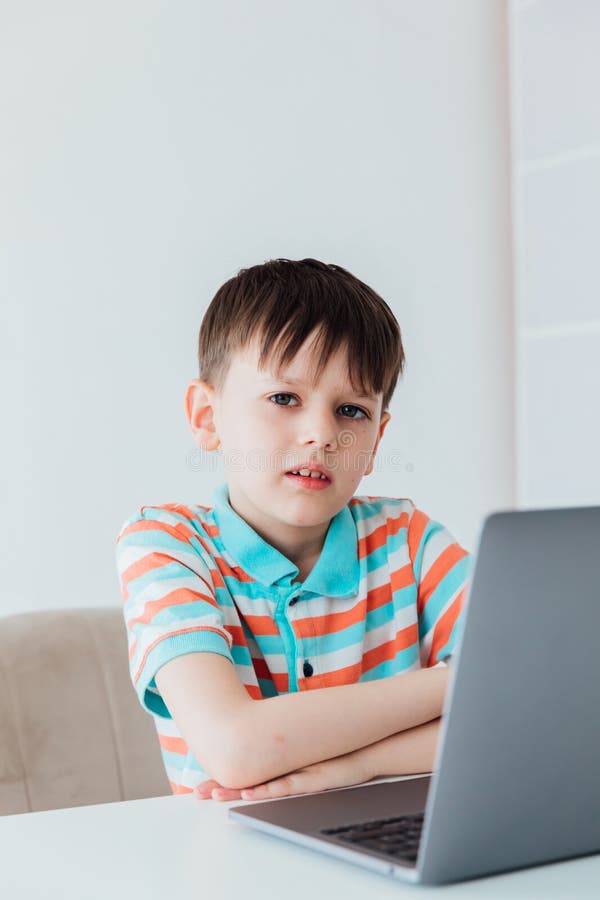 Boy Schoolboy Sitting at Table with Laptop Online Stock Image - Image ... Boy Schoolboy Sitting at Table with Laptop Online Stock Image - Image ...
