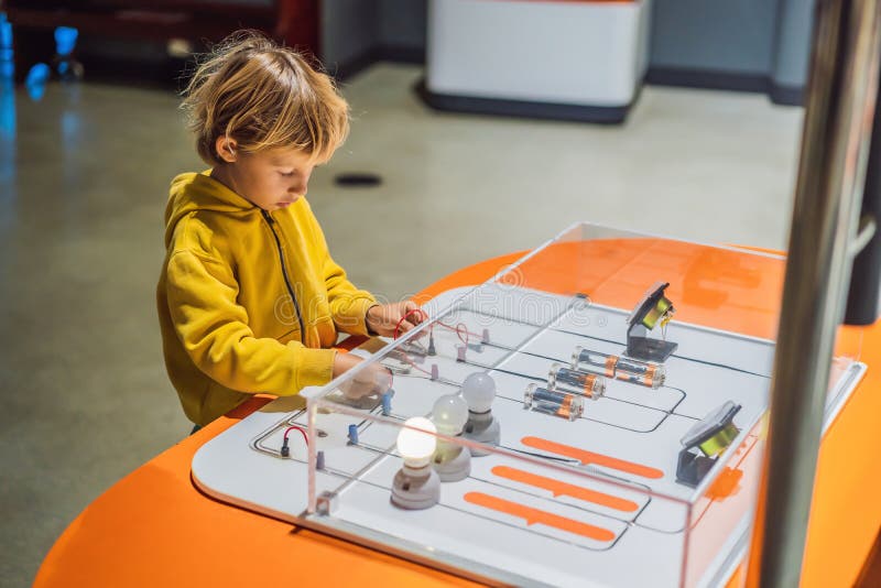 Boy in Science Class. the Child is Engaged in Science Stock Photo ...